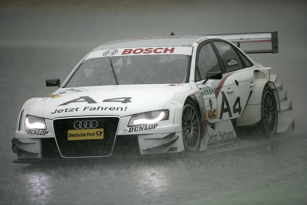 Three Audi A4 DTM cars at the top in rain | Audi MediaCenter